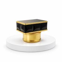 China Luxury Rectangular Black Faceted Zamac FEA15 Perfume Cap, Gold‑Trim Zinc Alloy Decorative Bottle for sale