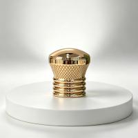 China Luxury Knurled Texture Zamac Perfume Bottle Cap Gold Plated Custom Logo Metal Perfume Lid for sale