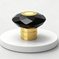 China Luxury Black Faceted Crystal Zamac Perfume Bottle Cap Gold Plated Custom Logo Metal Perfume Lid FEA 15 for sale