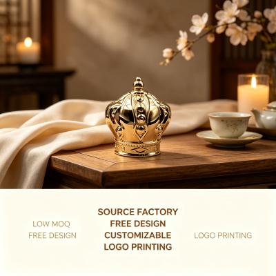 China Crown Shape Zinc Alloy Perfume Cap Luxury Gold Plated Metal Perfume Bottle Lid Custom Logo For Fragrance Cosmetic Packaging Magnetic for sale