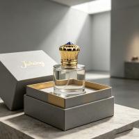 China Crown Shape Zinc Alloy Perfume Cap Luxury Gold Plated Perfume Bottle Lid With Blue Diamond Decoration Custom Logo For Cosmetic Glass Bottle Magnetic for sale