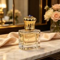 China Crown Shape Zinc Alloy Perfume Cap Luxury Gold Plated Perfume Bottle Lid With Blue Diamond Decoration Custom Logo For Cosmetic Glass Bottle Magnetic for sale