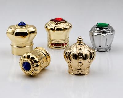 China High quality Crown Shape Zinc Alloy Perfume Cap Luxury Gold Plated Perfume Bottle Lid With Blue Gemstone Decoration Custom Logo for sale