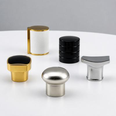China Modern Multi‑Shape Zamac Perfume Bottle Cap Leather Wrapped Square Round Handle Metal Lid Custom Logo For Fragrance Glass Bottle for sale