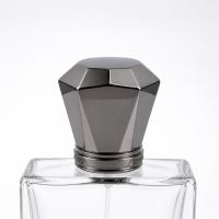 China Custom Zinc Alloy Perfume Cap Luxury Metal Fragrance Bottle Cap Faceted Design Electroplated Gold Silver Rose Gold Black Factory for sale