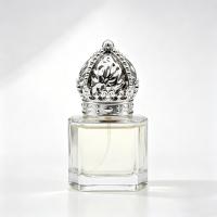 China Luxury Embossed Crown Zinc Alloy Perfume Cap Multi‑Color Electroplating Zamac Perfume Bottle Lid Custom Logo OEM ODM For Fragrance Glass Bottle for sale
