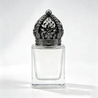 China Luxury Embossed Crown Zinc Alloy Perfume Cap Multi‑Color Electroplating Zamac Perfume Bottle Lid Custom Logo OEM ODM For Fragrance Glass Bottle for sale