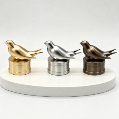 China Luxury Brushed Gold Swallow Bird Zamac Perfume Cap for FEA15 Perfume Bottle for sale