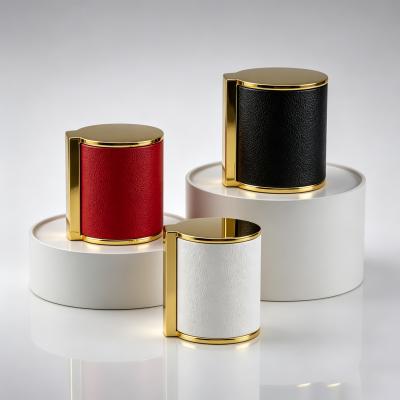 China Leather Wrapped Cylindrical Zinc Alloy Perfume Cap Metal Trim Zamac Lid Custom Logo For Fragrance Bottle OEM for sale