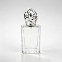 China Luxury FEA15 Perfume Bottle Cap Zinc Alloy 3D Embossed Floral Bud Top Electroplated Fragrance Bottle Lid Custom Zamac Perfume Cap for sale