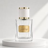 China Luxury Square Clear Glass Perfume Bottle With White Leather Wrapped Zamac Cap, Thick Base Empty Fragrance Spray Bottle, Custom Metal Logo Glass Perfume Container for sale