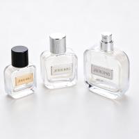 China Luxury Square Clear Glass Perfume Bottle With White Leather Wrapped Zamac Cap, Thick Base Empty Fragrance Spray Bottle, Custom Metal Logo Glass Perfume Container for sale