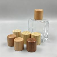China Cylindrical Wooden Bottle Cap Custom Engraved Logo Natural Wood Lid For Perfume Cosmetic Bottle OEM Wholesale for sale