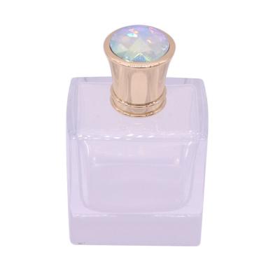 China Custom Zamac Perfume Bottle Caps with Stone - Eco-Friendly Metal Lids in Gold or Custom Colors (200PCS/Box) for sale
