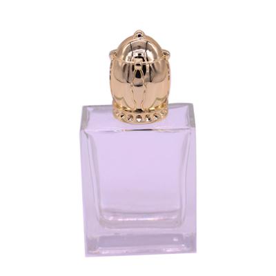 China Gold Tone Metal Bullet-Shaped Zamac Perfume Cap 26×42mm for FEA15 Bottles with Custom Design Options for sale