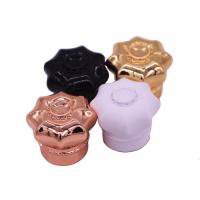 China Custom Crystal Zinc Alloy Perfume Cap 22x27mm Flower Crown Design for FEA15 Bottle for sale