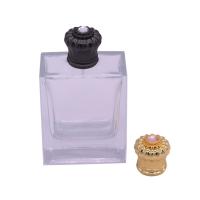 China Custom Zinc Alloy Perfume Cap 26x33x31mm Metal Perfume Cover in Black Gold Color for Bottle for sale