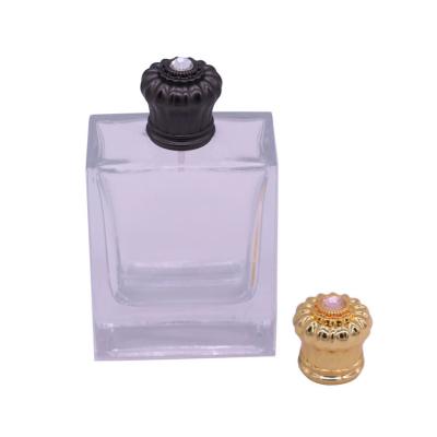 China Custom Zinc Alloy Perfume Cap 26x33x31mm Metal Perfume Cover in Black Gold Color for Bottle for sale