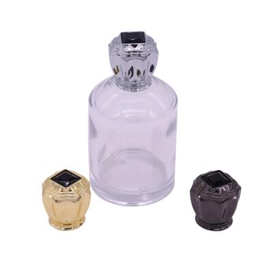 China Zinc Alloy Diamond Crown Perfume Bottle Cap 23x33mm Custom Color for sale
