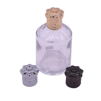 China Custom Zinc Alloy Perfume Bottle Caps 24mm x 30mm with Multiple Finishes and Logo Options for sale