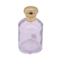 China Custom Zinc Alloy Perfume Cap 23x31mm for Empty Perfume Bottles Gold Finish for sale