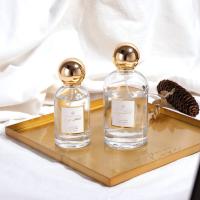 China OEM Empty Round Glass Zamac Gold Luxury Perfume Bottle 50ML 100ML with Custom Logo Printing for sale