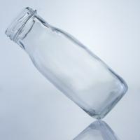 China Glass Collar Stopper Cap 250ml 330ml Empty Round Bottle for Juice Tea Coffee Beverage for sale