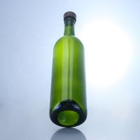 China 700ml Antique Green Glass Bottle for Spirits Rum Gin Oil and Beer Base Material Glass for sale
