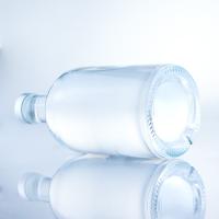 China Round Glass Bottle 375ml Clear Empty Bottle For Spirits With Acid Etch Surface Handling for sale