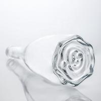 China Custom Logo Unique Floral Bottom Super Flint Long Neck 750ml Glass Bottle for Gin Cork for sale