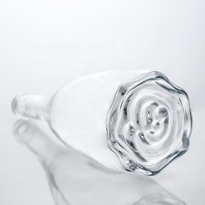 China Custom Logo Unique Floral Bottom Super Flint Long Neck 750ml Glass Bottle for Gin Cork for sale