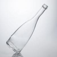 China Custom Logo Unique Floral Bottom Super Flint Long Neck 750ml Glass Bottle for Gin Cork for sale