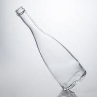 China Custom Logo Unique Floral Bottom Super Flint Long Neck 750ml Glass Bottle for Gin Cork for sale
