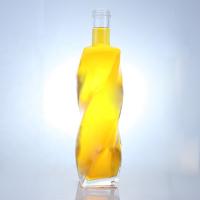 China Customized Logo Special Shaped Glass Bottle Spirits 700ml 750ml With Screw Cap for sale