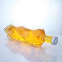 China Customized Logo Special Shaped Glass Bottle Spirits 700ml 750ml With Screw Cap for sale