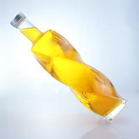 China Customized Logo Special Shaped Glass Bottle Spirits 700ml 750ml With Screw Cap for sale
