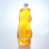 China Customized Logo Special Shaped Glass Bottle Spirits 700ml 750ml With Screw Cap for sale