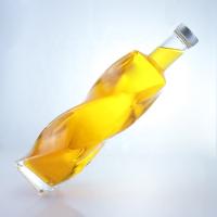 China Customized Logo Special Shaped Glass Bottle Spirits 700ml 750ml With Screw Cap for sale