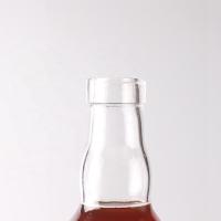 China Collar Material Glass 500ml 700ml Embossed Transparent Bottle for Whisky Rum Gin Brandy for sale