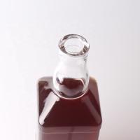 China Collar Material Glass 500ml 700ml Embossed Transparent Bottle for Whisky Rum Gin Brandy for sale