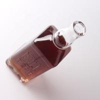 China Collar Material Glass 500ml 700ml Embossed Transparent Bottle for Whisky Rum Gin Brandy for sale