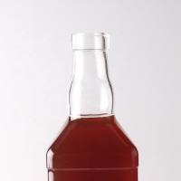 China Collar Material Glass 500ml 700ml Embossed Transparent Bottle for Whisky Rum Gin Brandy for sale