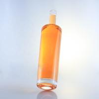China 750ml Long Neck Flint Glass Bottle with Corks and Acid Etch Surface Handling for sale