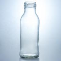 China Clear Glass Beverage Bottle Popular 100ml260ml 500ml 1000ml Round Bottle with Screw Cap for sale