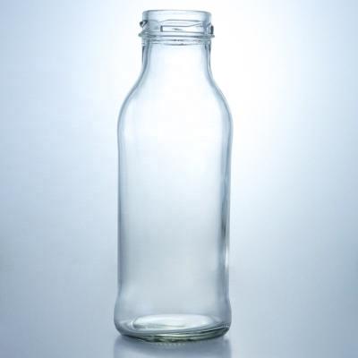 China Clear Glass Beverage Bottle Popular 100ml260ml 500ml 1000ml Round Bottle with Screw Cap for sale
