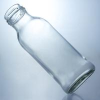 China Clear Glass Beverage Bottle Popular 100ml260ml 500ml 1000ml Round Bottle with Screw Cap for sale
