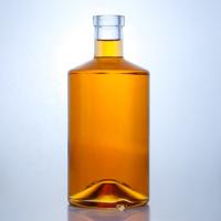 China Avialable Clear Oval Shape Flask Wine Bottle 500ml 700ml 750ml With Corks for Beverage for sale