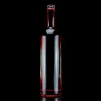 China Coating Red Color 750ml Tequila Glass Bottle with Unique Design and Cork for sale