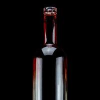 China Coating Red Color 750ml Tequila Glass Bottle with Unique Design and Cork for sale