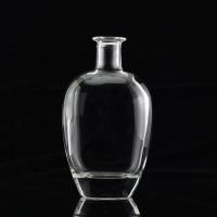 China Acid Etch Surface Handling Tequila Glass Bottles with Round Neck and Empty Flint for sale